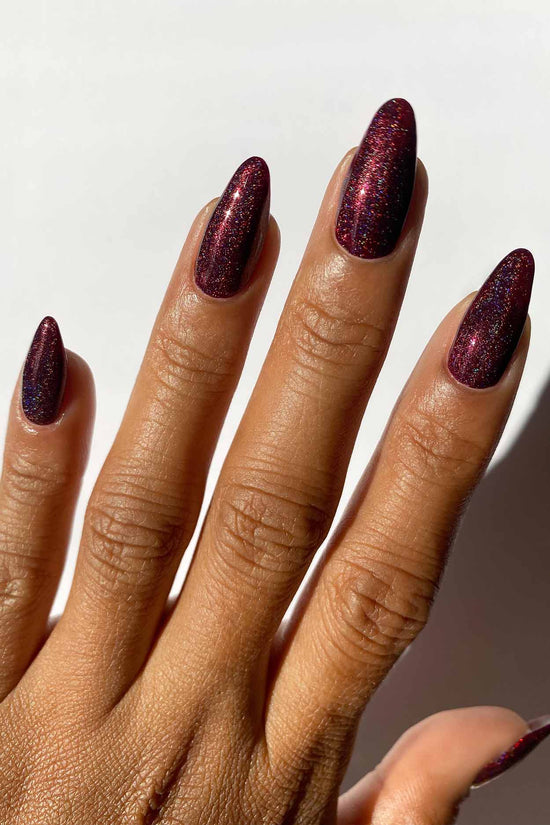 Oxblood red linear holographic nail polish - Cirque Colors Ambrosia