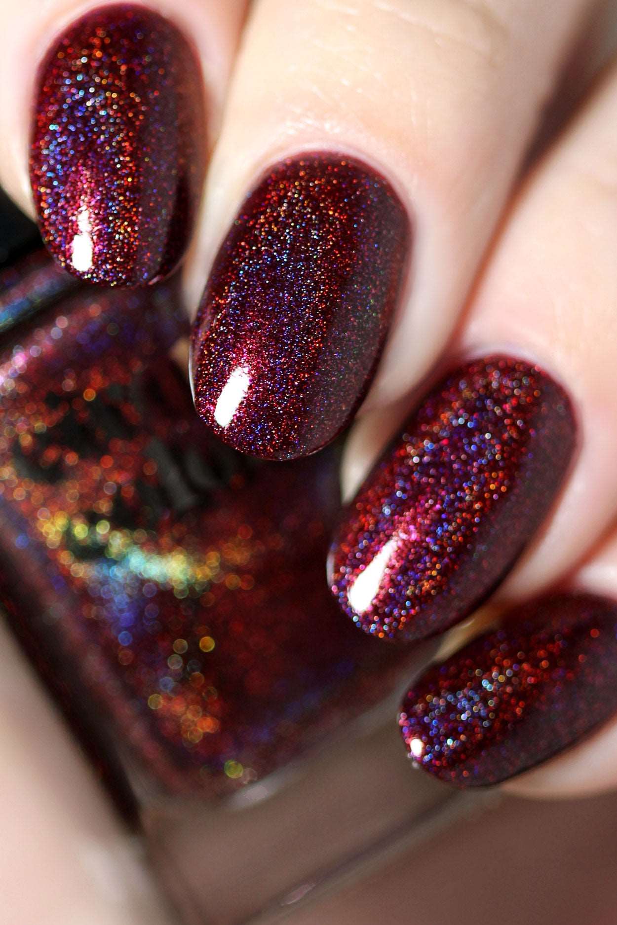Oxblood red linear holographic nail polish - Cirque Colors Ambrosia